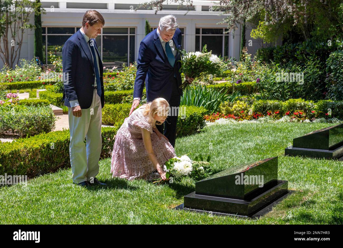 Christopher Nixon Cox, left, stands with his father, Edward Cox, right ...