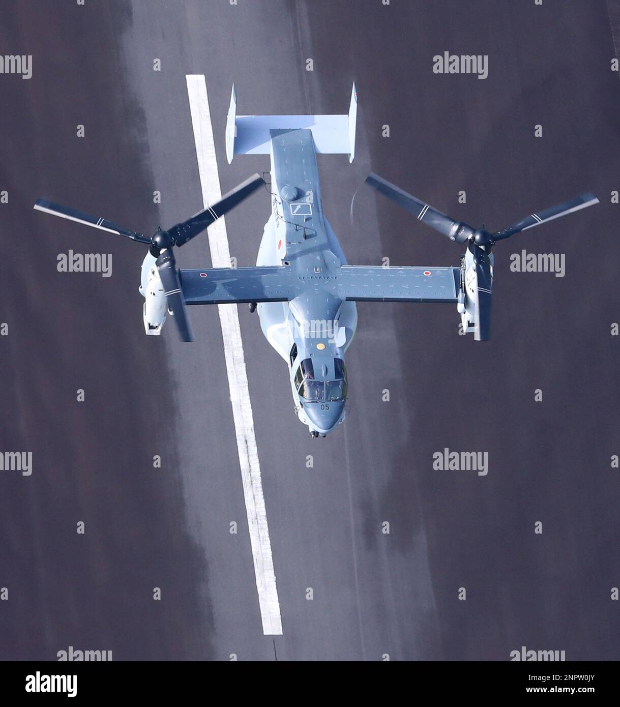 An aerial photo shows a Bell Boeing V-22 Osprey of Japan Ground Self ...