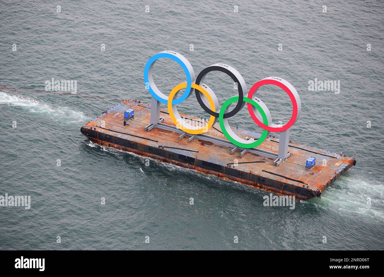 An aerial photo shows a monument of five-ring emblem transported by ...