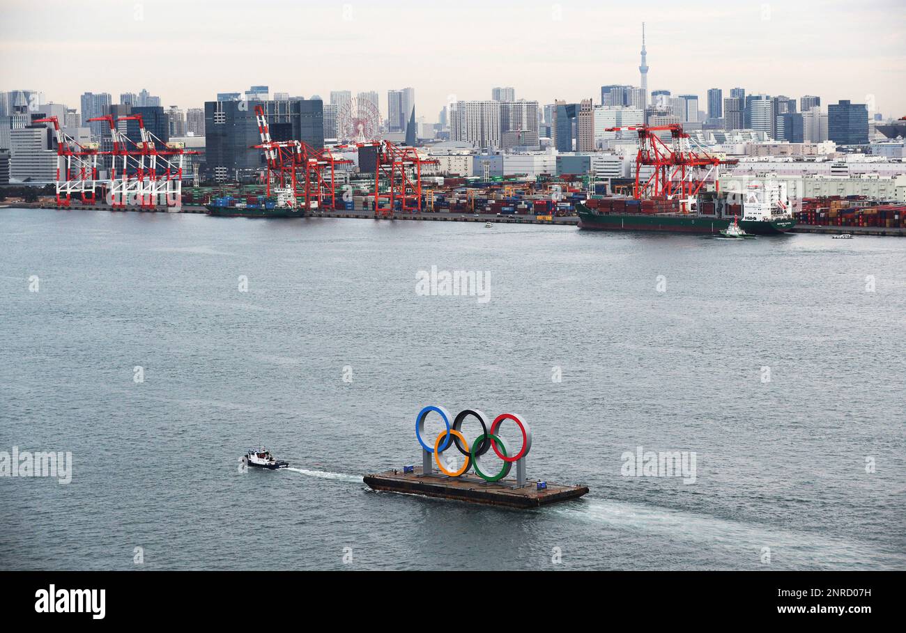 An aerial photo shows a monument of five-ring emblem transported by ...