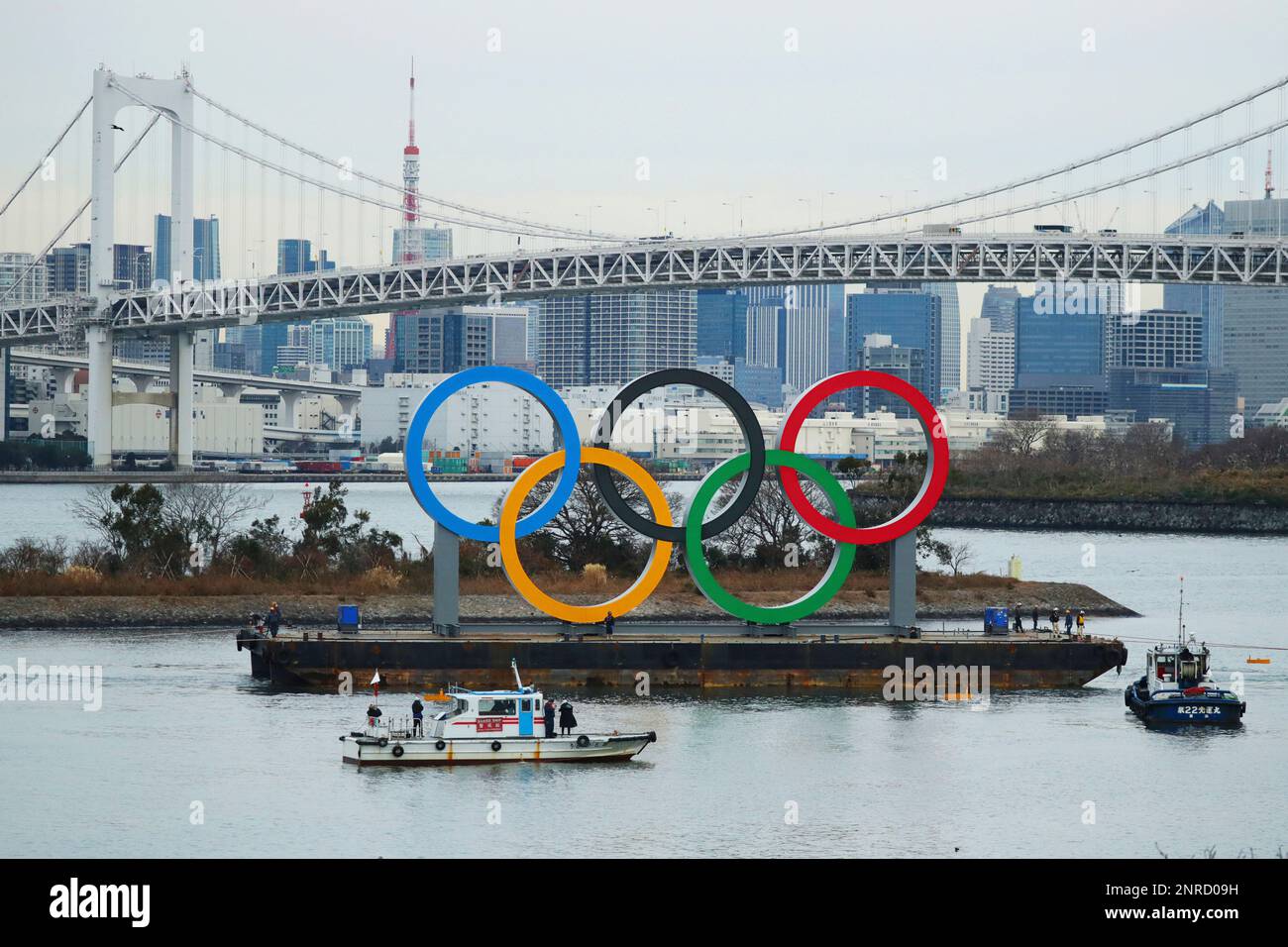 A monument of five-ring emblem is set up on the water to enhance ...