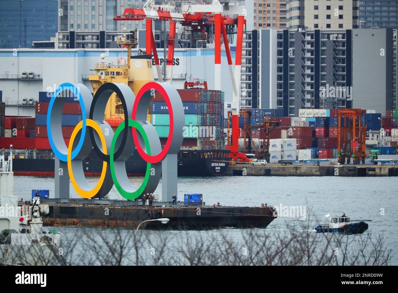 A monument of five-ring emblem is set up on the water to enhance ...