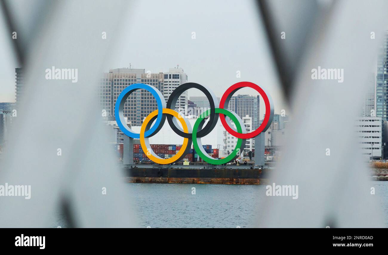 A monument of five-ring emblem is set up on the water to enhance ...