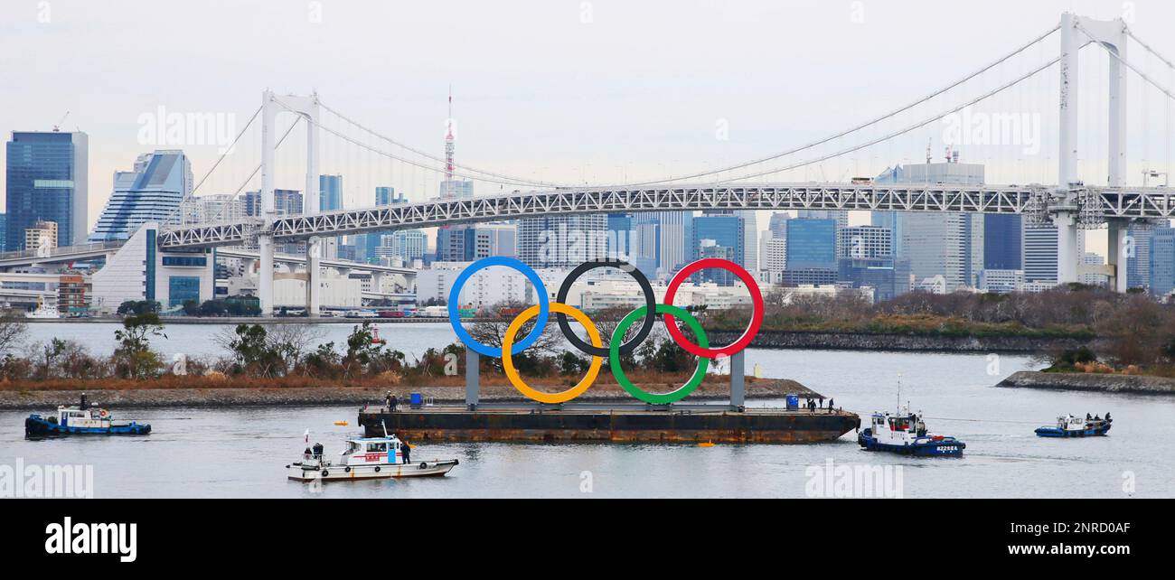 A monument of five-ring emblem is set up on the water to enhance ...