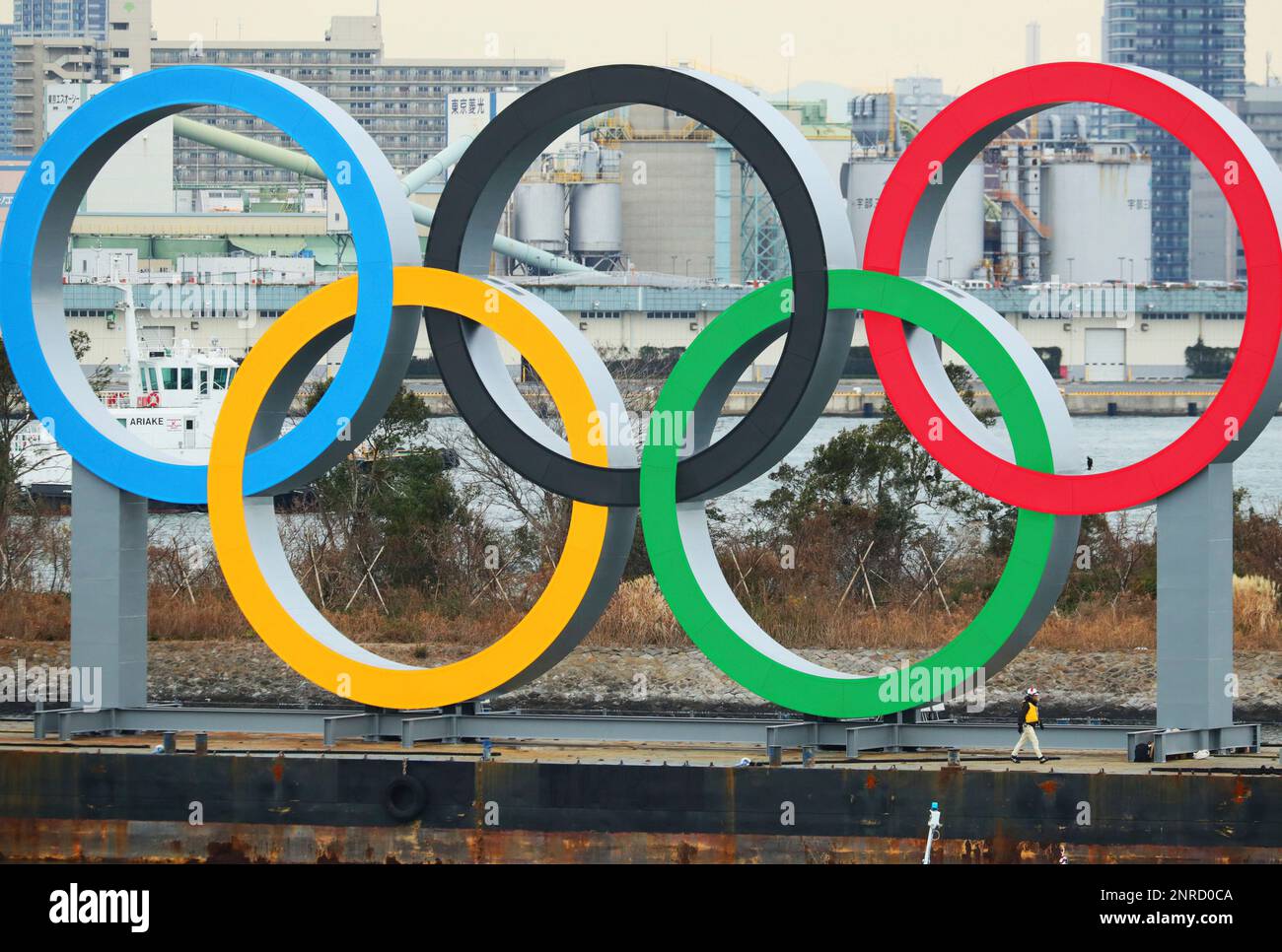 A monument of five-ring emblem is set up on the water to enhance ...