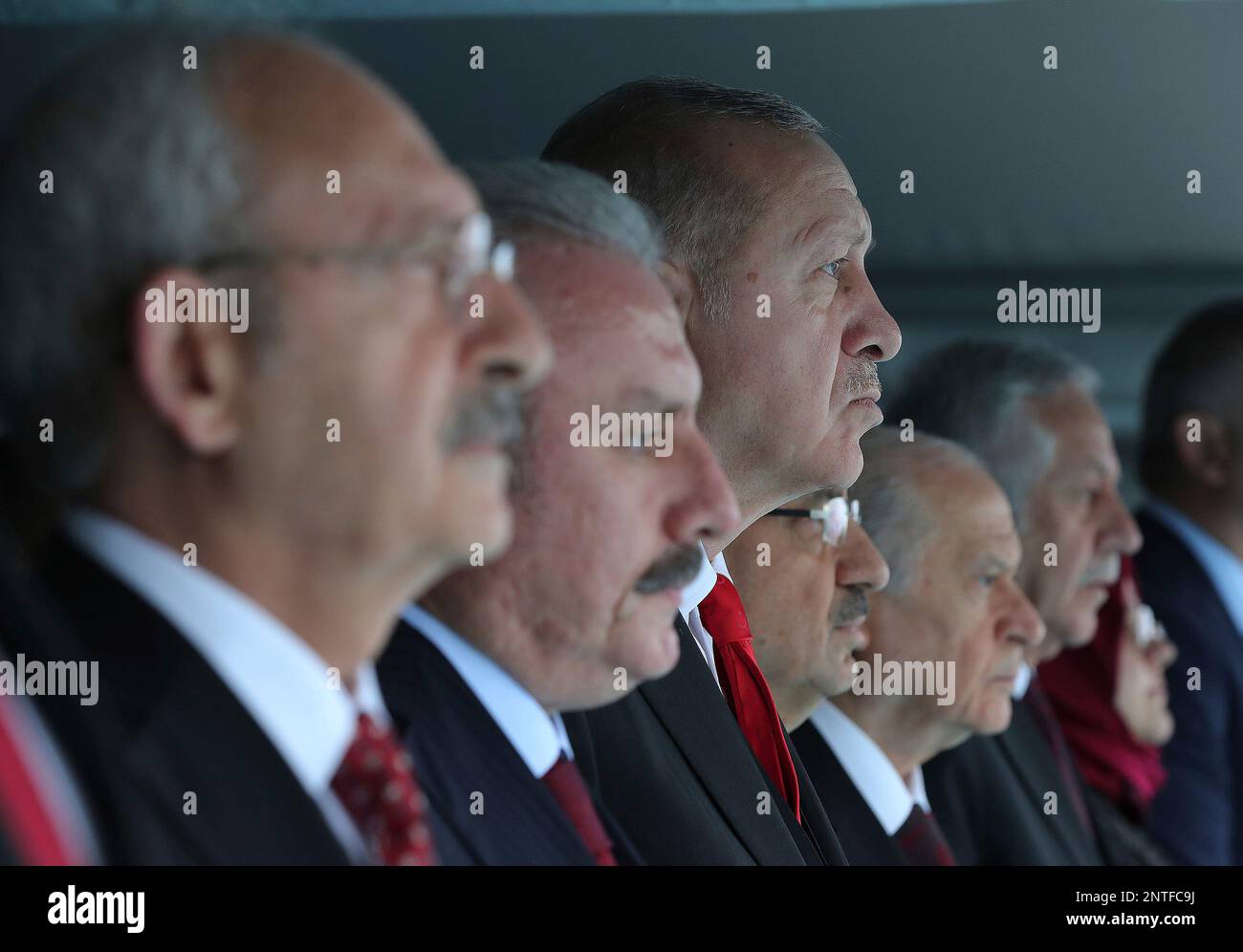 Turkey's President Recep Tayyip Erdogan, center, stands with other ...