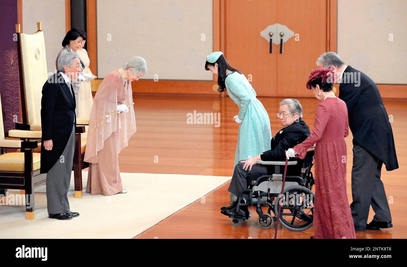 Japan's Emperor Akihito and Empress Michiko (L) attend a ceremony for ...