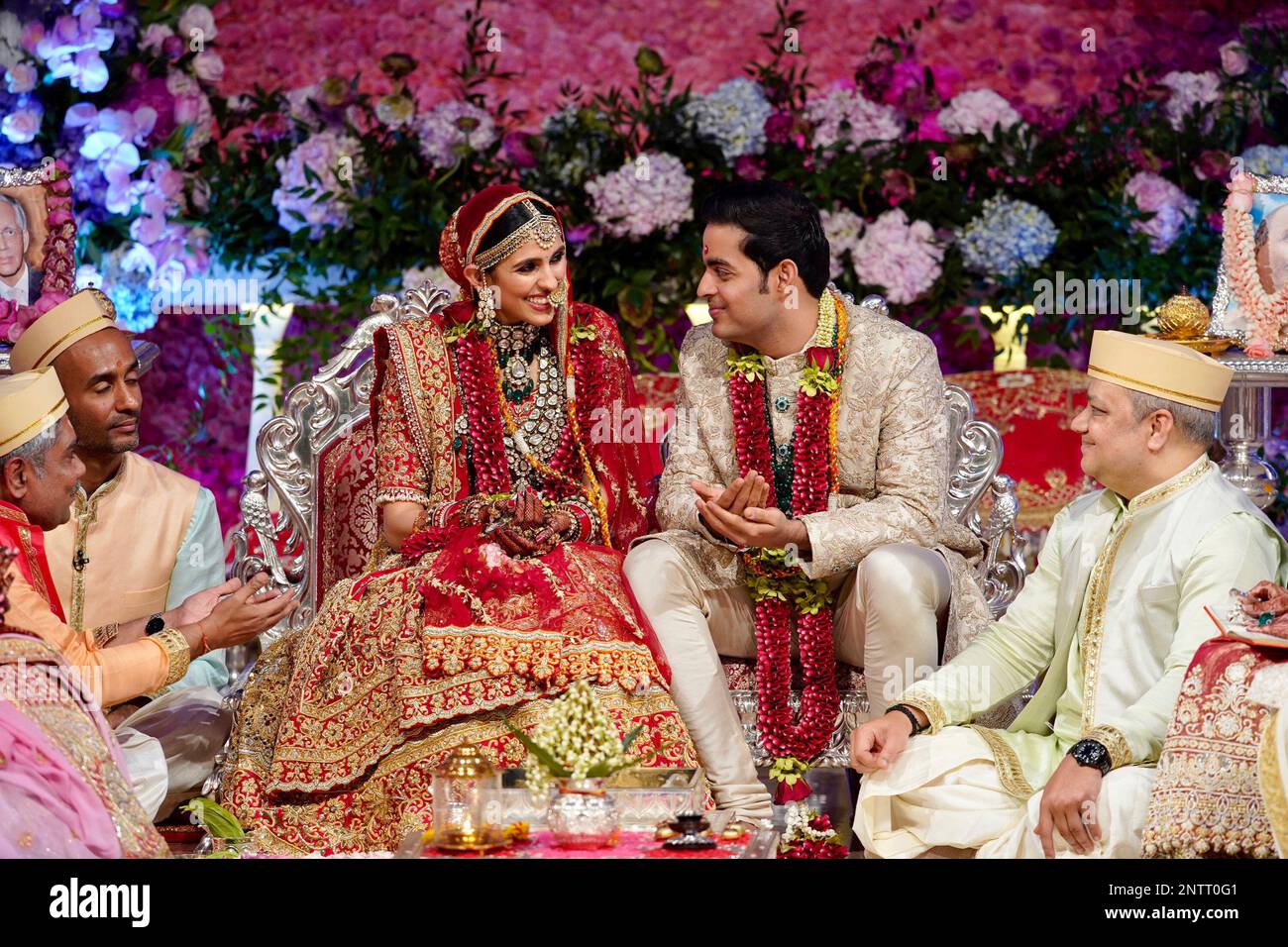 In this Saturday, March 9, 2019 photo, Akash Ambani, second right, son ...