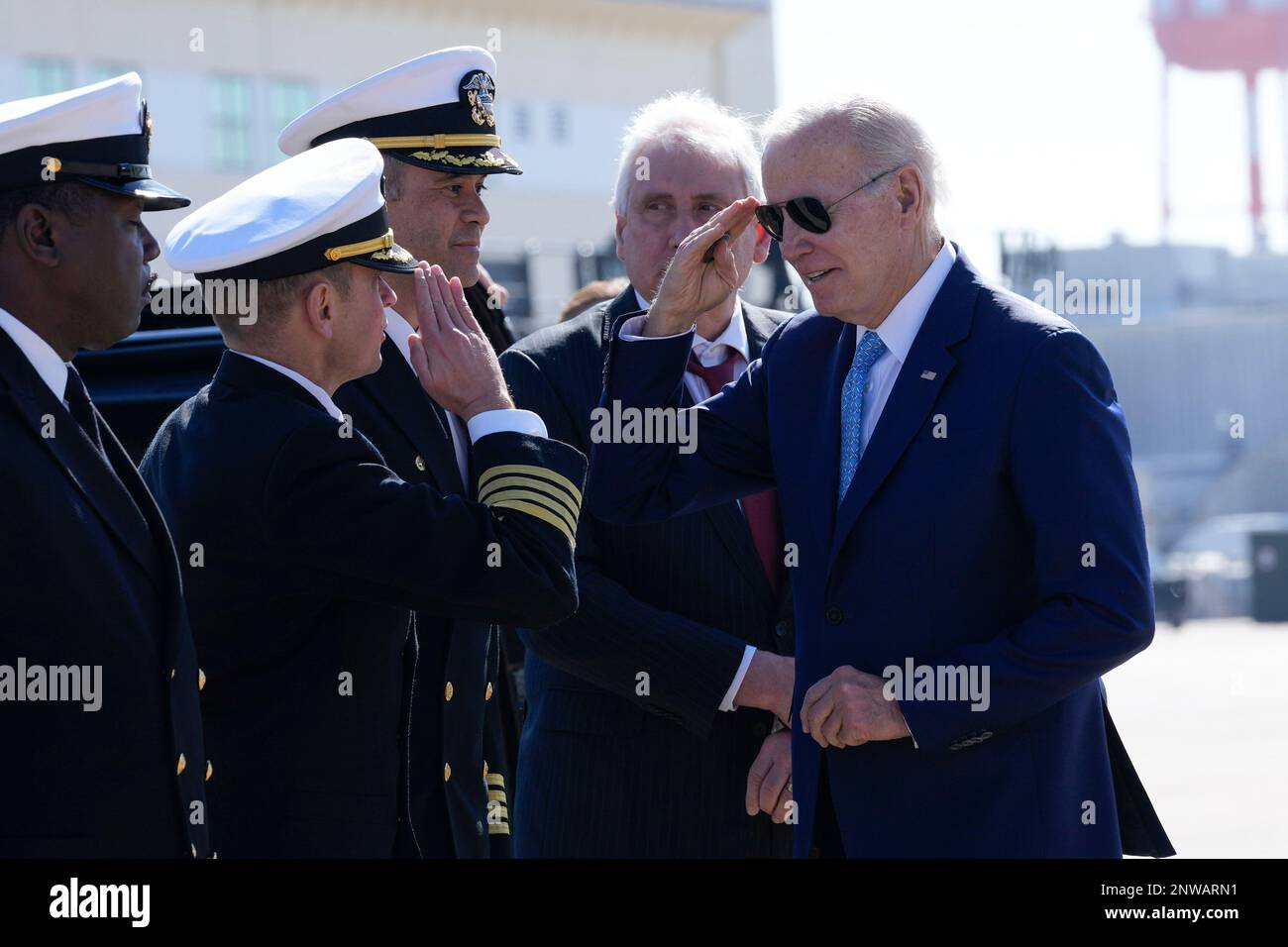President Joe Biden greets, from left, Command Master Chief De'Andre ...