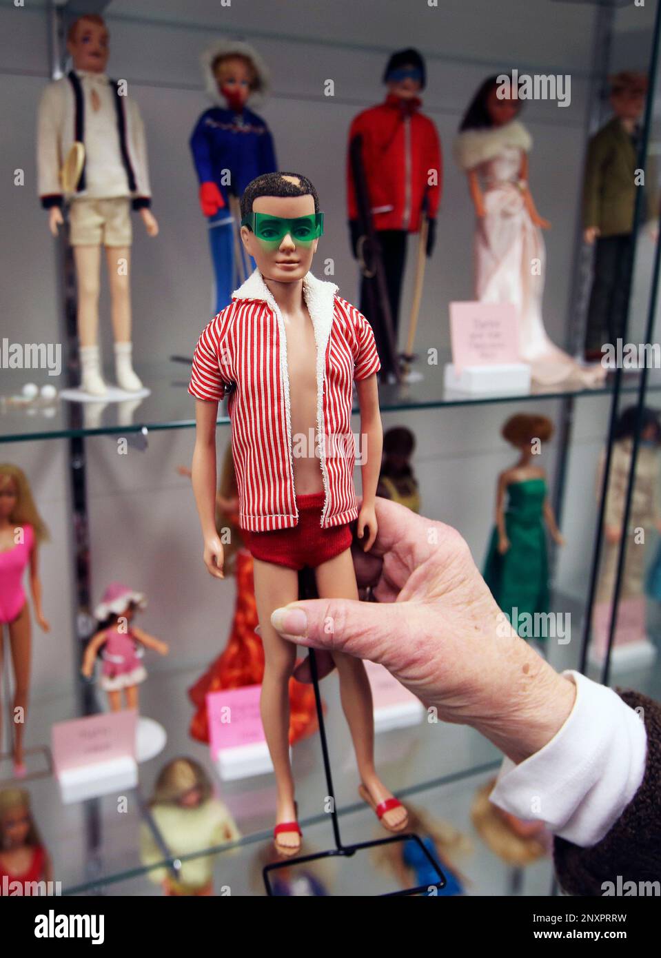In this Wednesday, Jan. 3, 2018 photo, a rare Ken doll with a bald spot ...