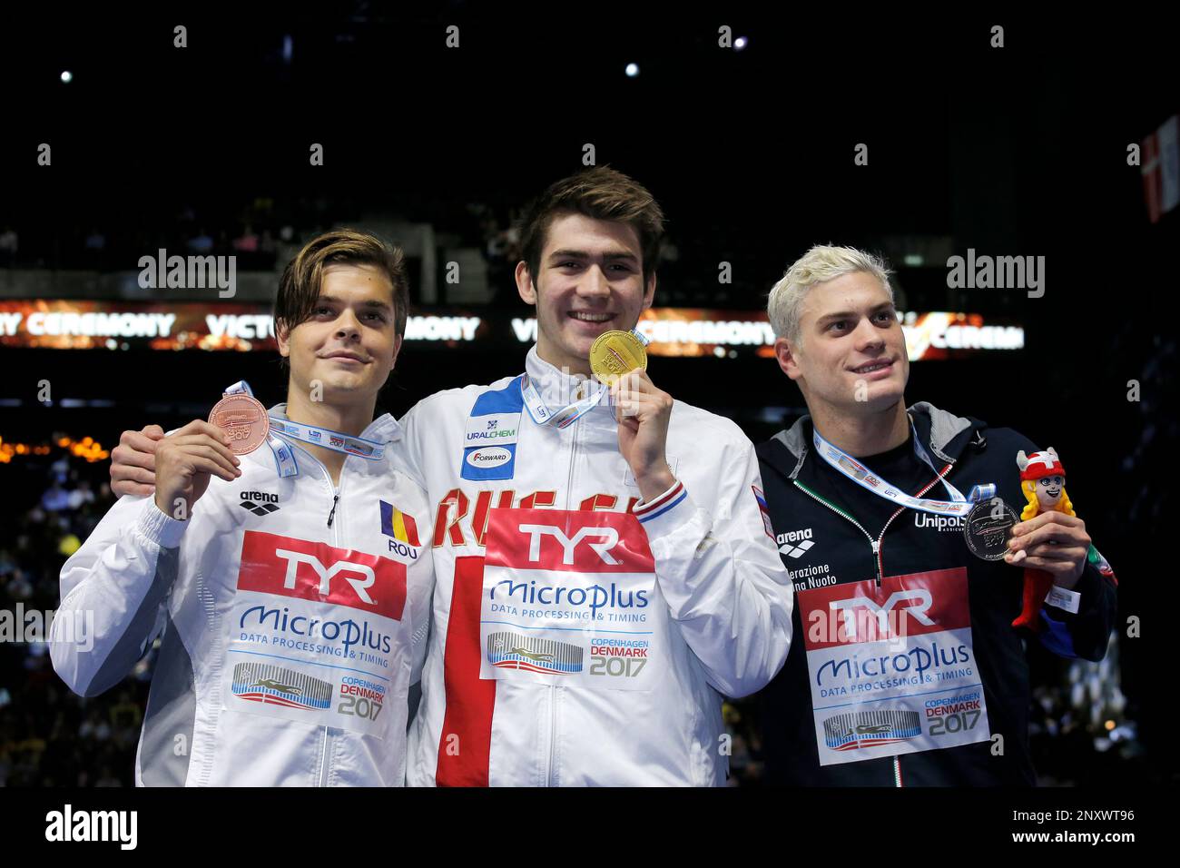 From left: Third place Robert-Andrei Glinta of Romania, winner Kliment Kolesnikov of Russia and ...