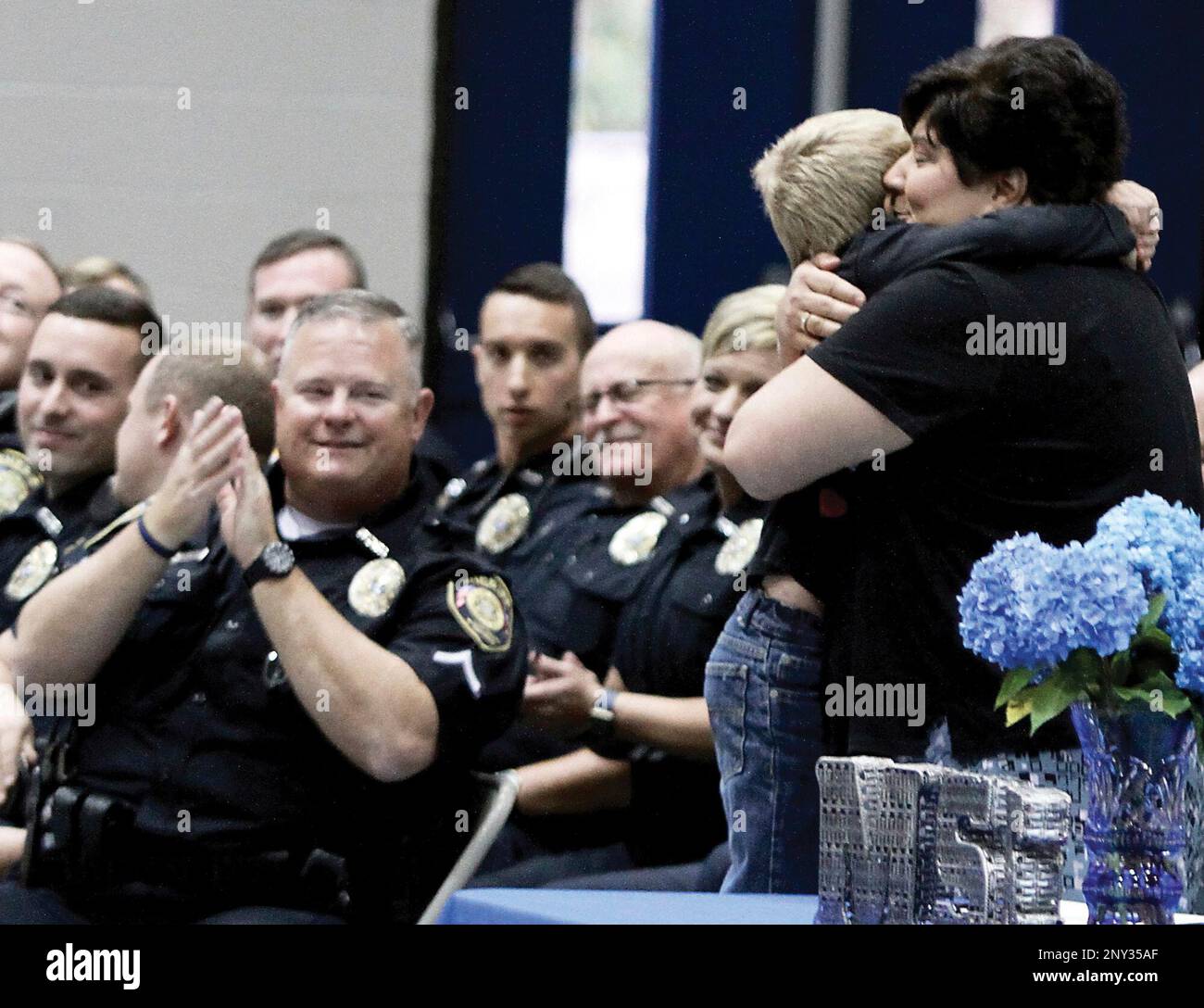 In this Nov. 1, 2017 photo, first-grader Ryan Dyer embraces teacher ...