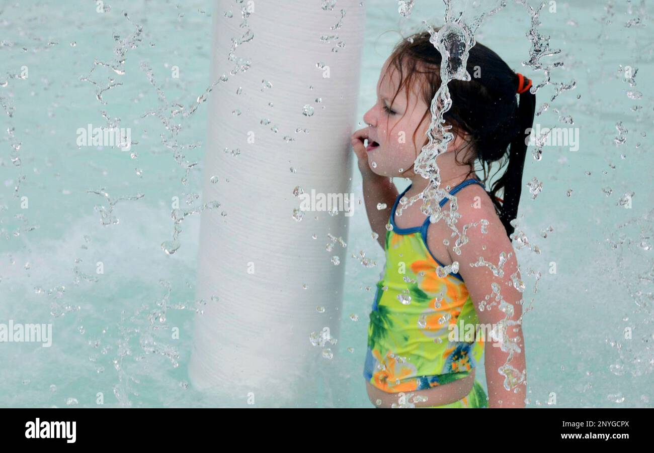 As temperatures rise into the low 90's, 4-year-old Delilah Boyle finds ...