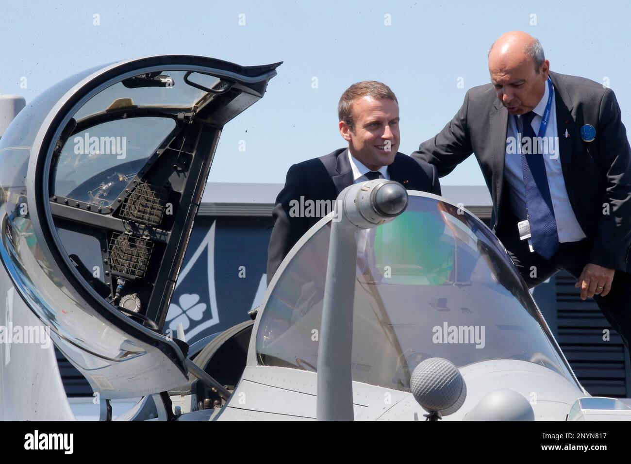 French President Emmanuel Macron exits the cockpit of a Rafale jet ...