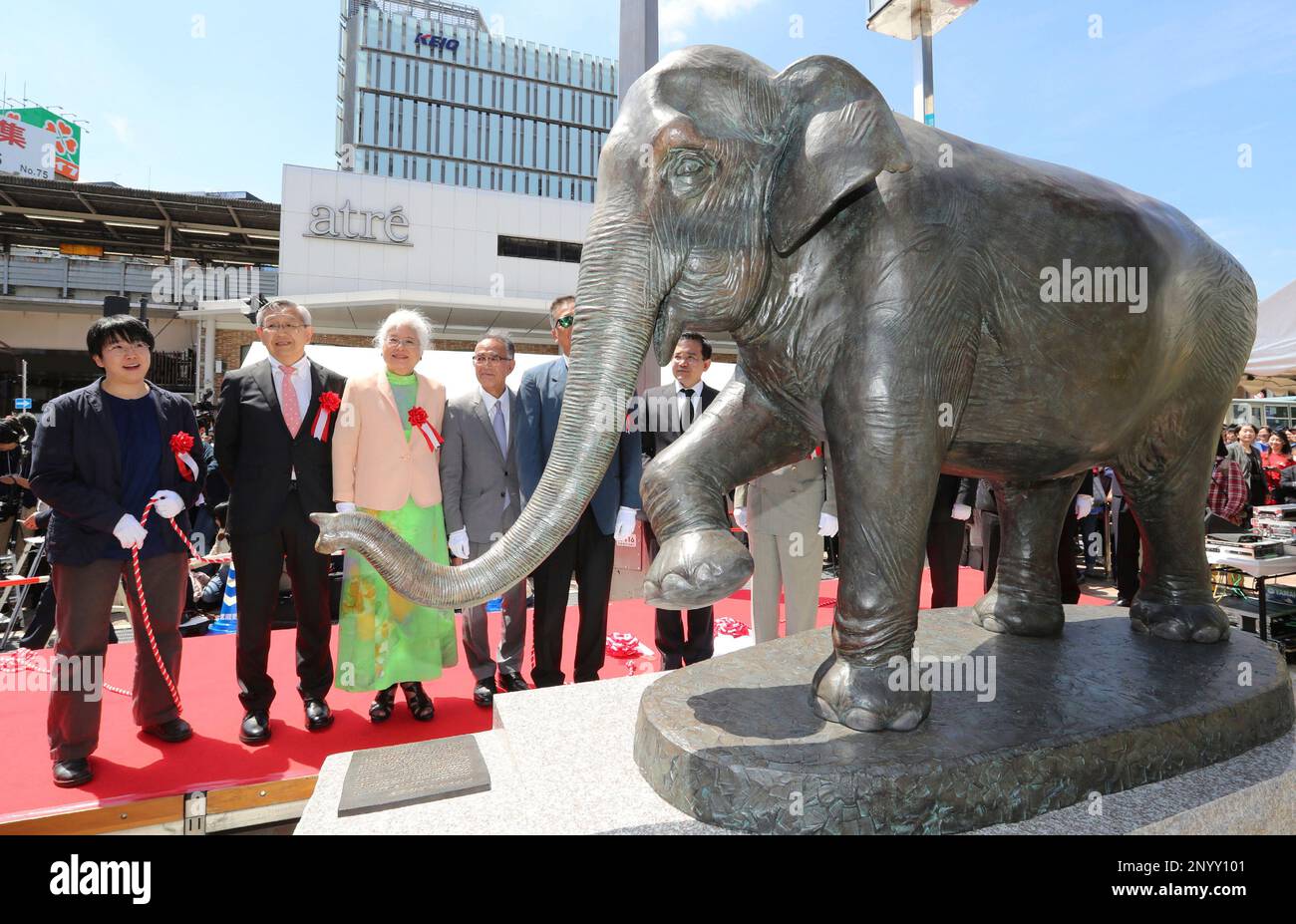 A statue of Hanako is seen as its original model creator Aki Fueda, far ...