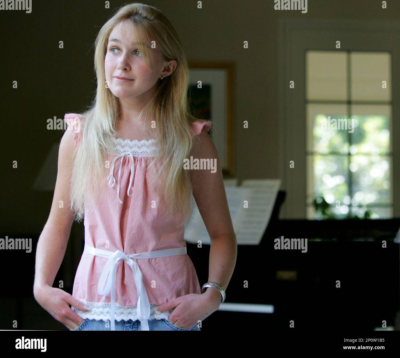In this photo taken in 2005, Amy Winn poses in her home in Eugene, Ore ...