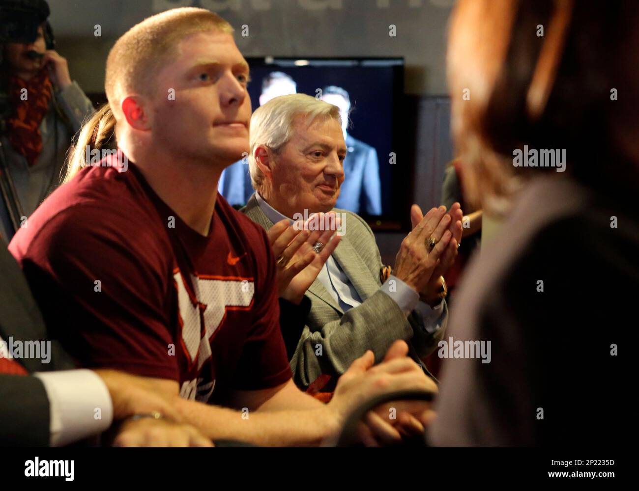 Virginia Tech head football coach Frank Beamer, center, applauds next ...