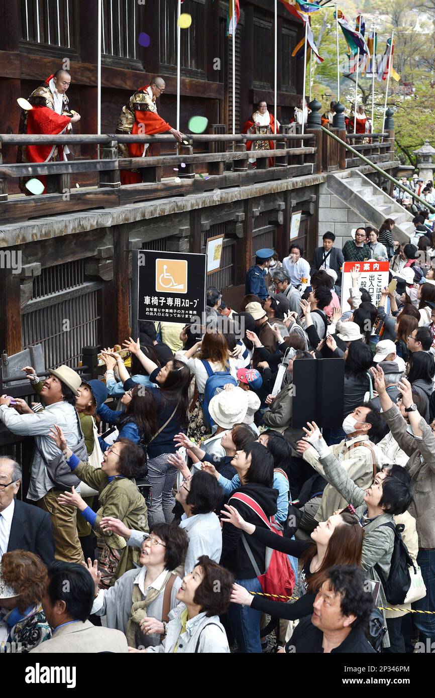 Priests perform a sange at the main hall of Zenkoji temple in Nagano ...
