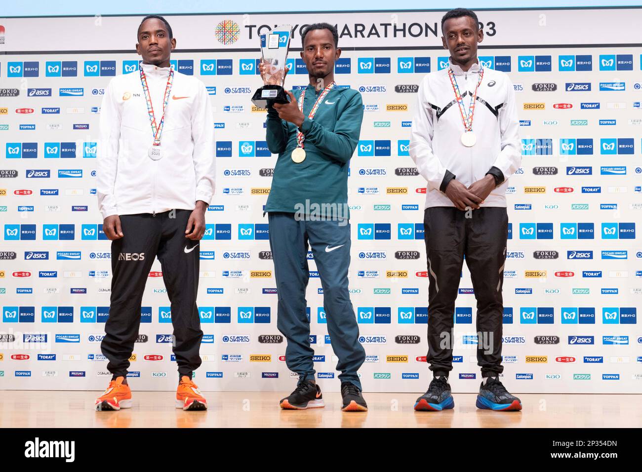 Ethiopian marathon runners, from left to right, second-placed Mohamed ...