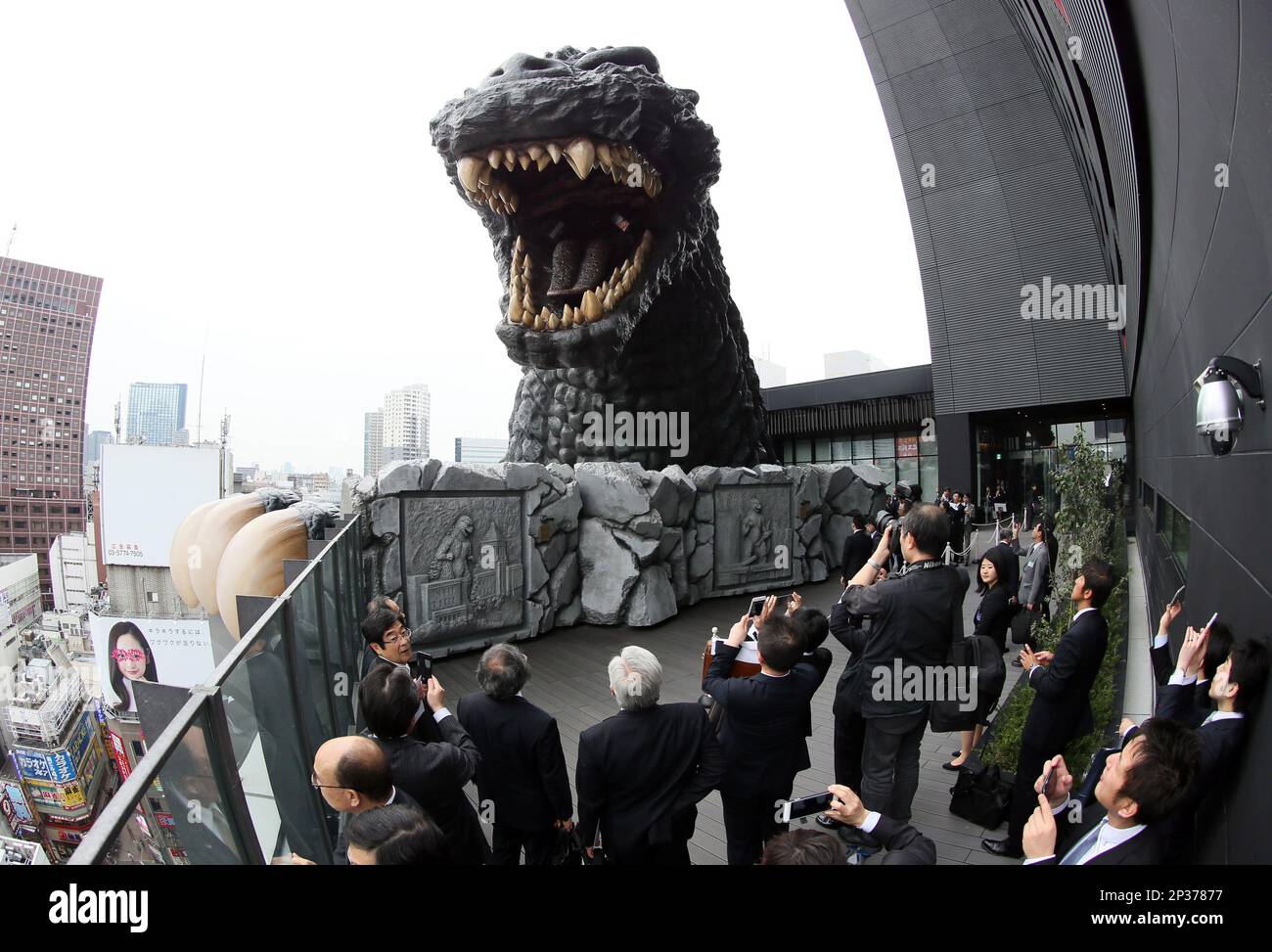 Godzilla's head is unveiled during the opening ceremony of the newly ...