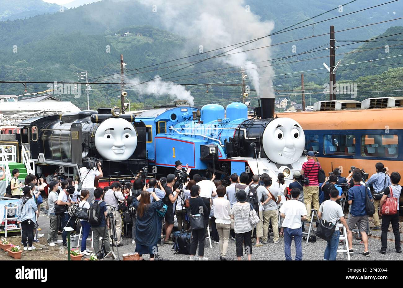 Thomas the Tank Engine (C) lines with his friend Hiro (L), the JNR ...