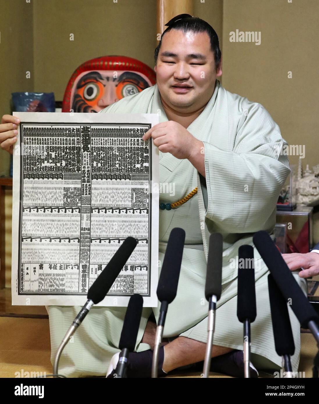 Newly promoted yokozuna Kakuryu shows the ranking list for next month's ...
