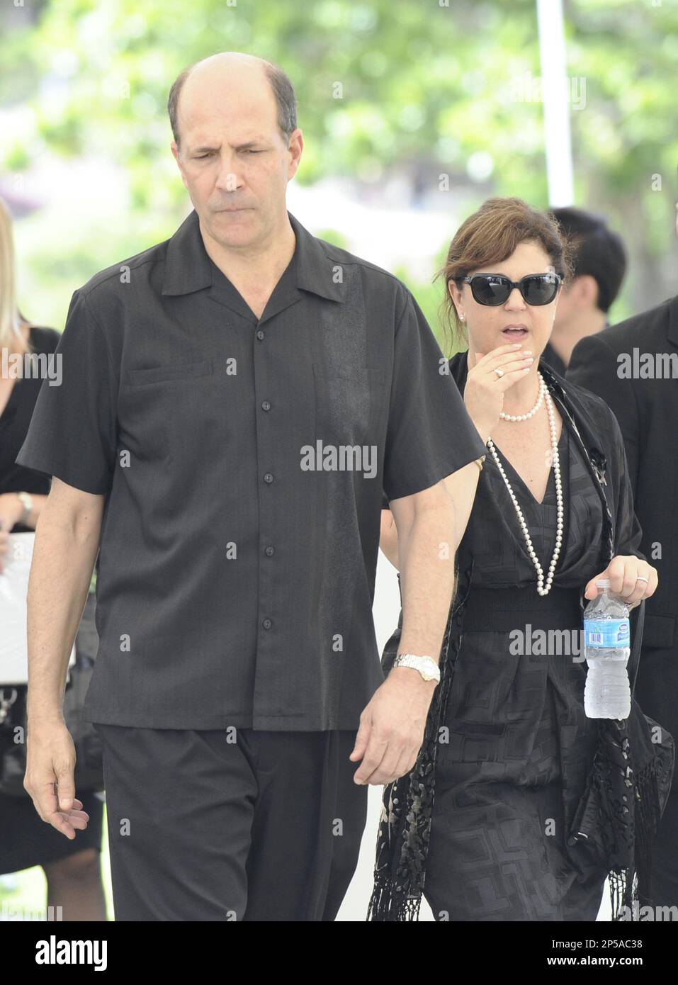 U. S. Ambassaor to Japan John Roos (L) attends a memorial service on ...
