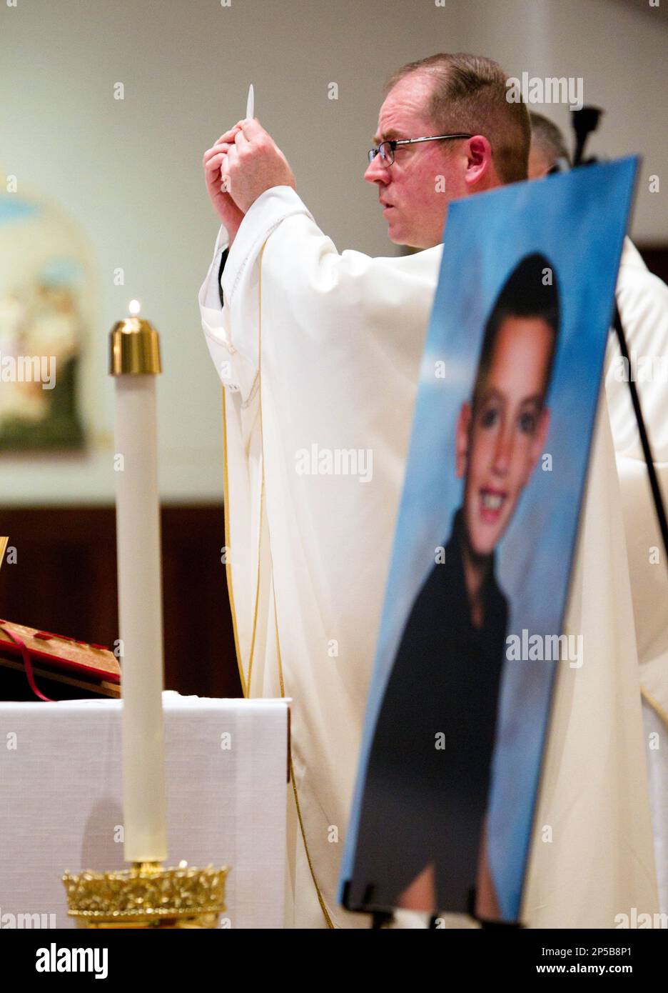 Father Sean Connor, pastor at St. Ann Church in Boston, celebrates the ...