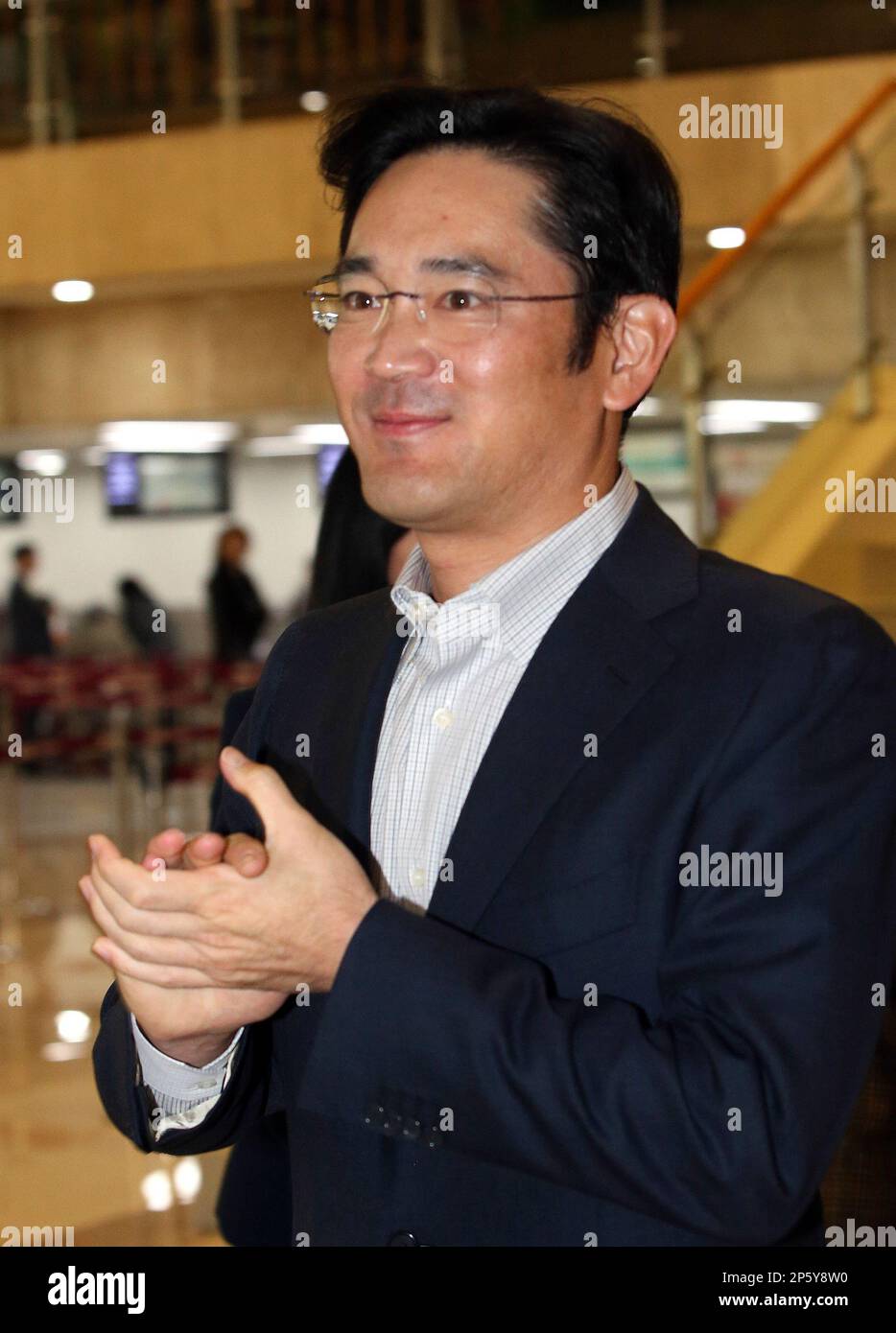 In this photo taken Monday, Dec. 3, 2012, Jay. Y Lee, the oldest child ...