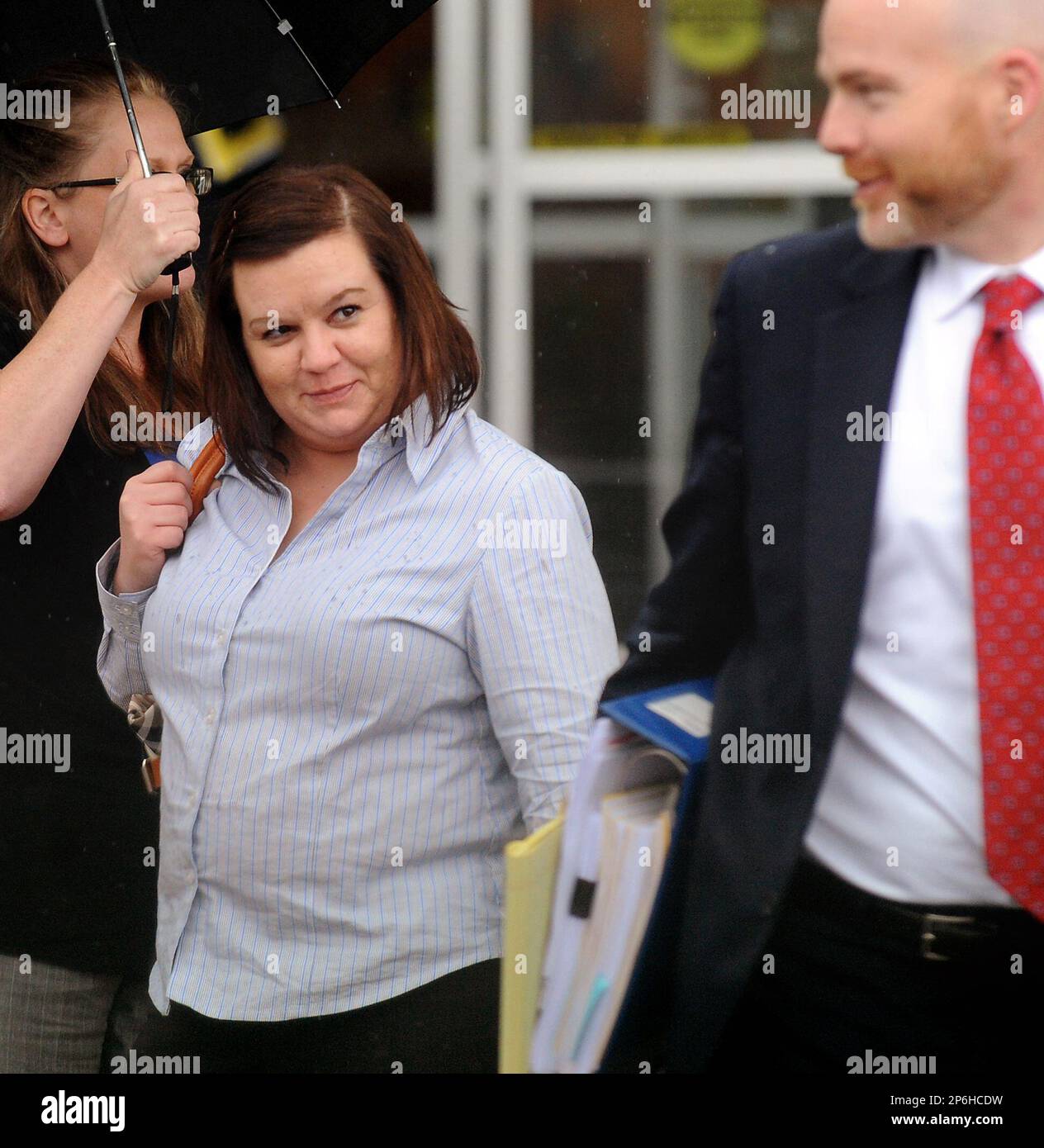 In a March 20, 2012 photo, Kimberly Saenz, left, talks with her ...