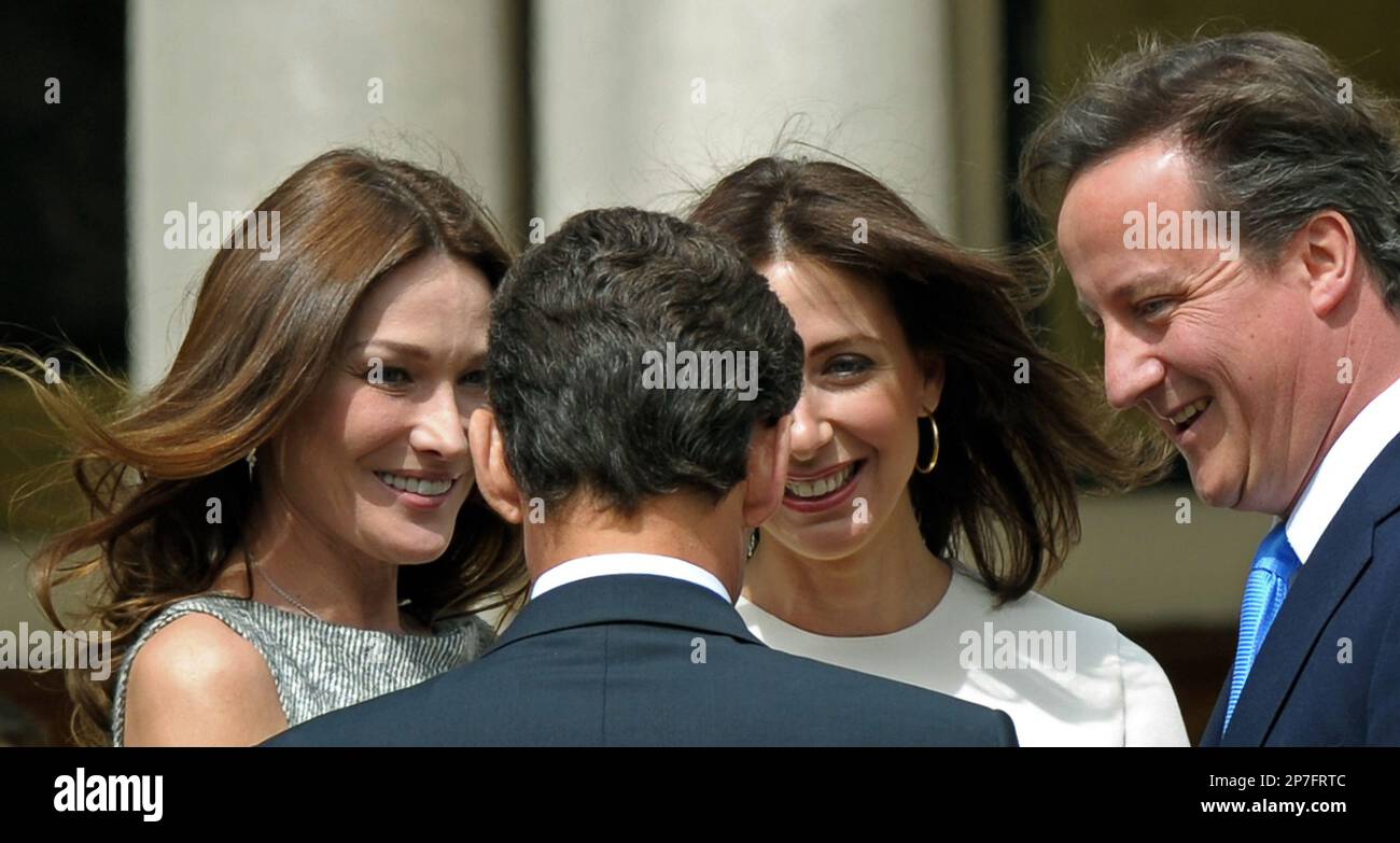 French First Lady, Carla Bruni-Sarkozy , left, and her husband, French ...