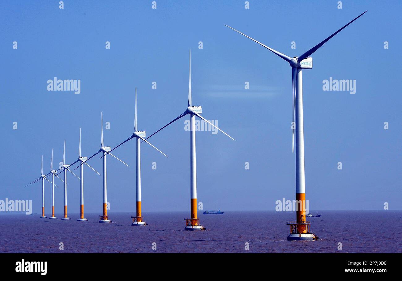 A view of the wind turbines at the Donghai Bridge Offshore Wind Farm ...