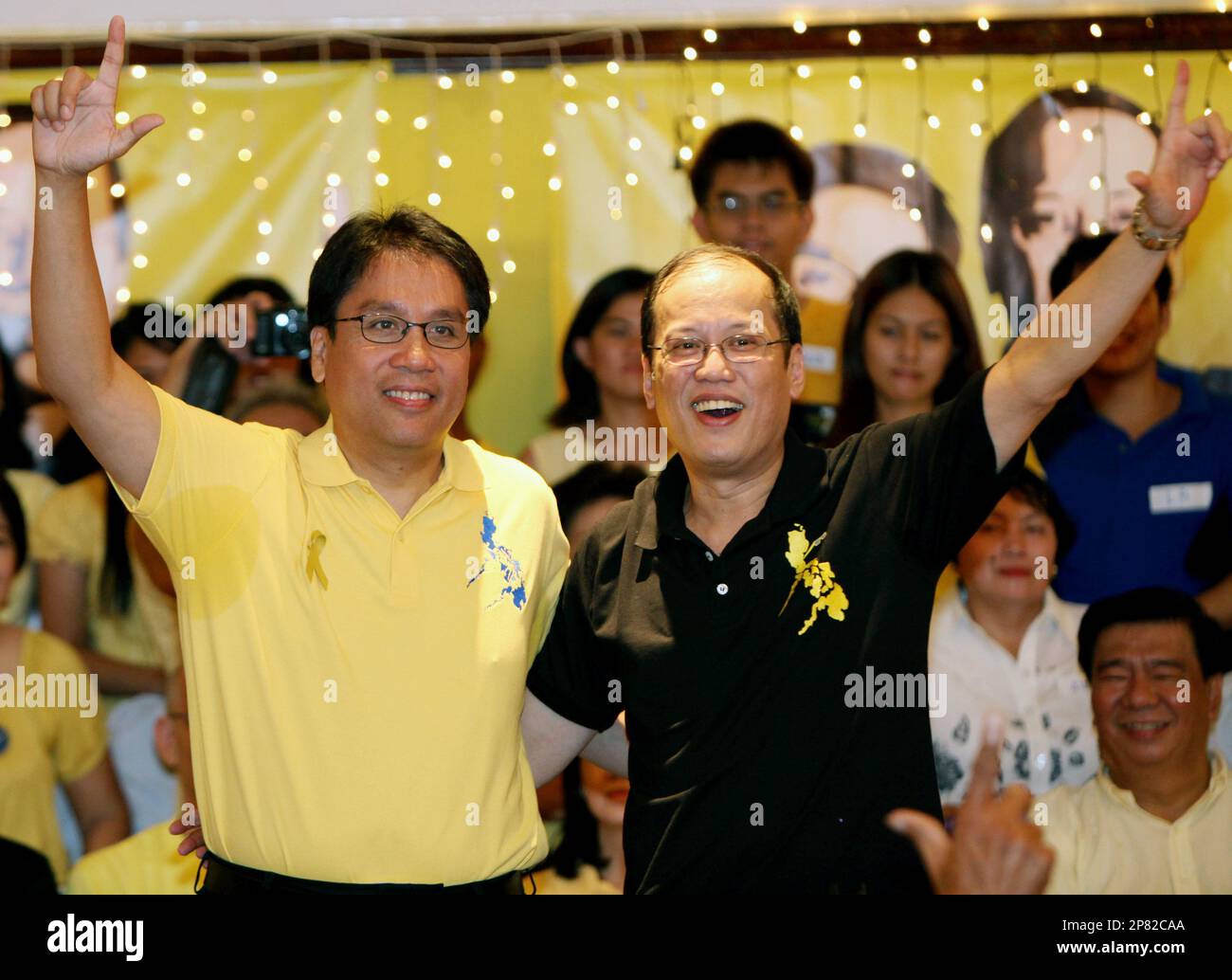 Philippine Sen. Benigno "Noynoy" Aquino III, right, the only son of ...