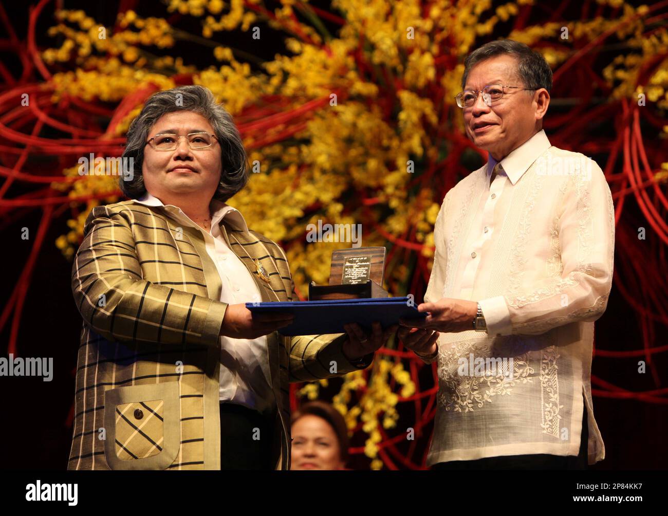 Krisana Kraisintu of Thailand, left, a 2009 Ramon Magsaysay awardee ...