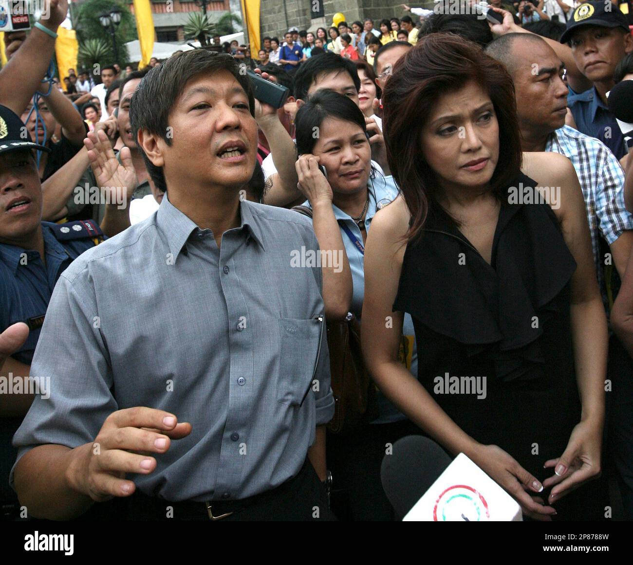 Ferdinand Marcos Jr., left, and Imee Marcos, right, children of the ...