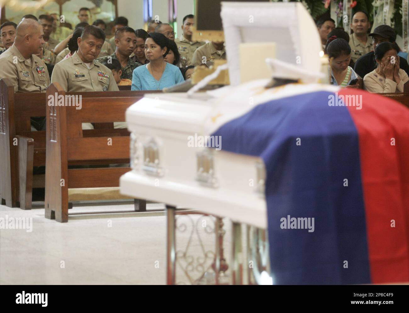 Philippine President Gloria Macapagal Arroyo, third from left front row ...