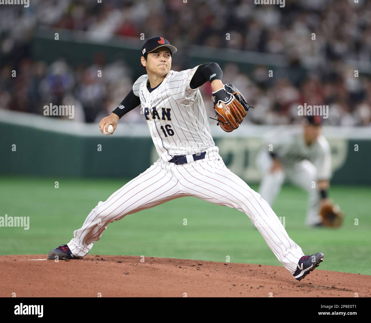 Japanese Shohei Ohtani throws a ball in the first inning during the ...