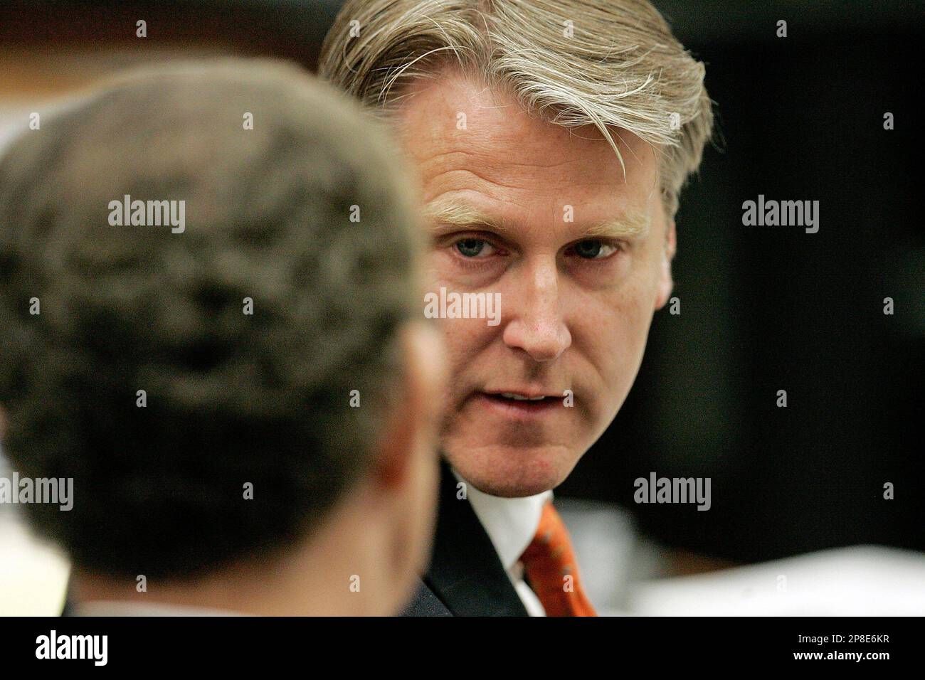 Defense Attorney Timothy Bradl, right rear, confers with co-defense ...