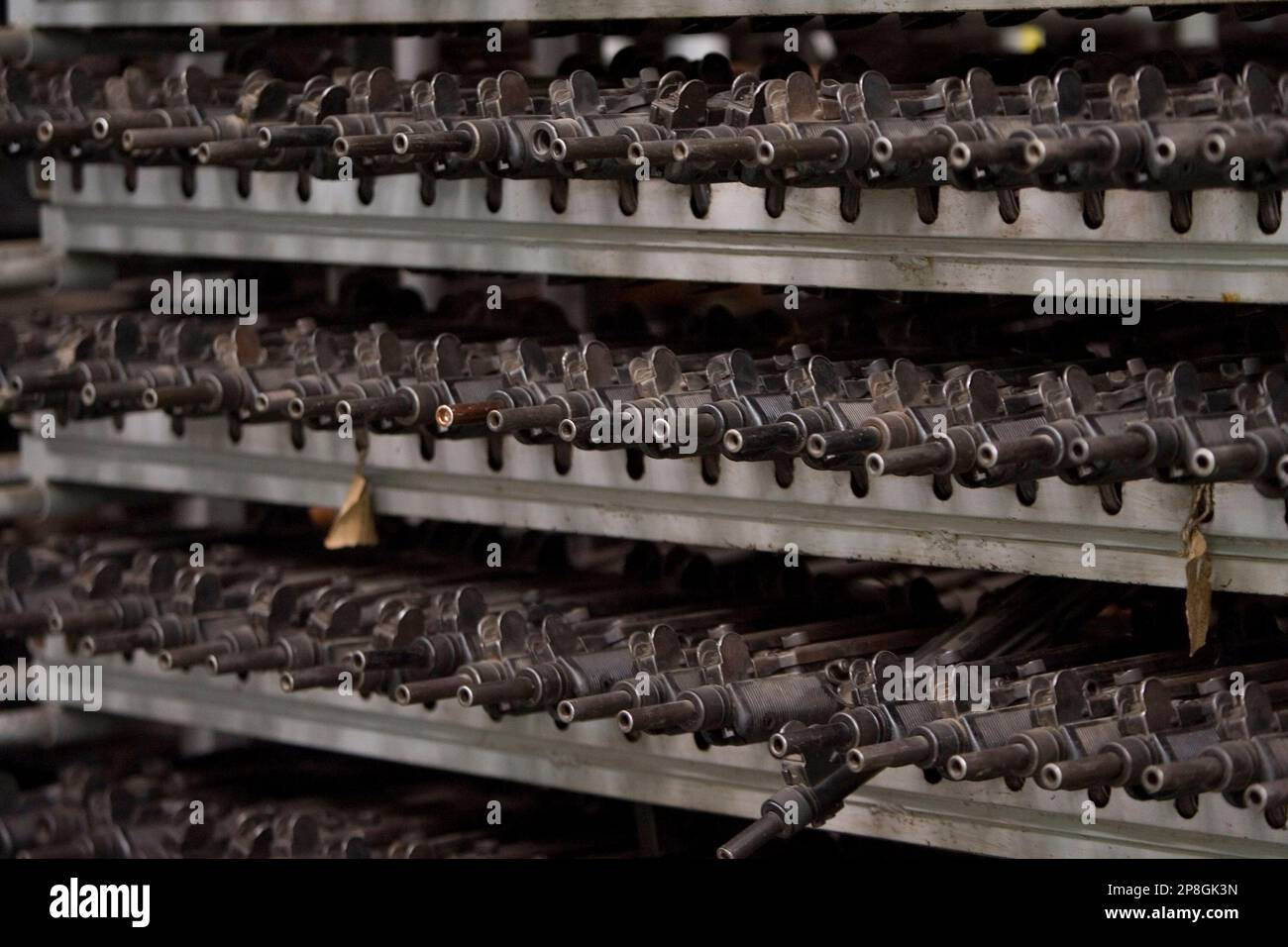 In this April 24, 2009 photo, seized weapons sit on racks in a seized ...