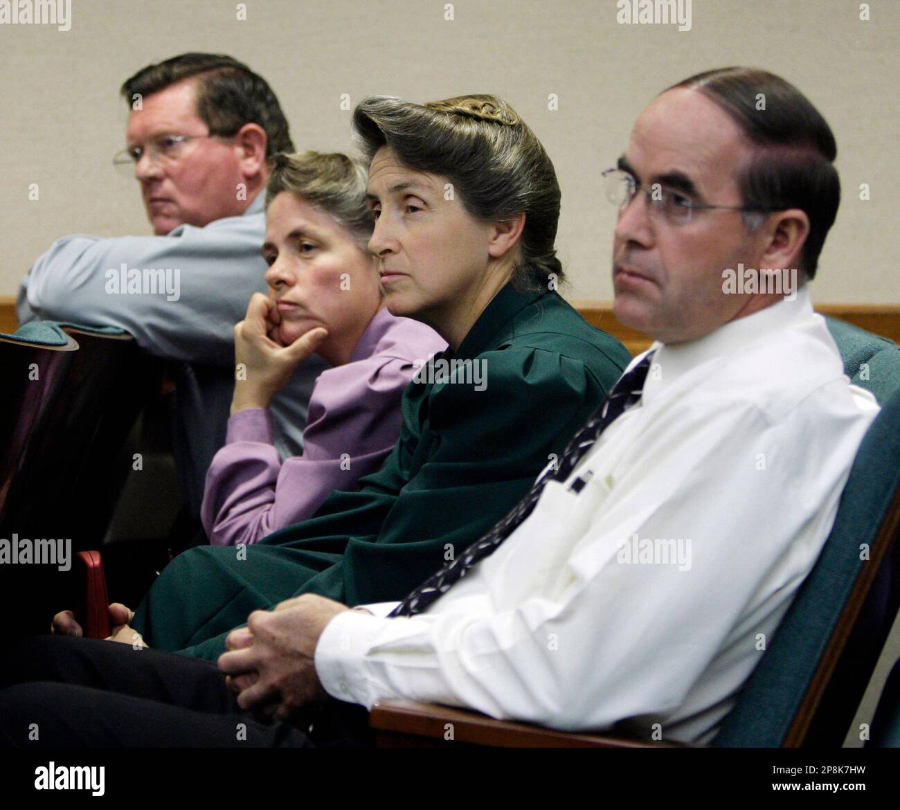 Members of the Yearning for Zion Ranch, left to right, Edson Jessop, Jr ...