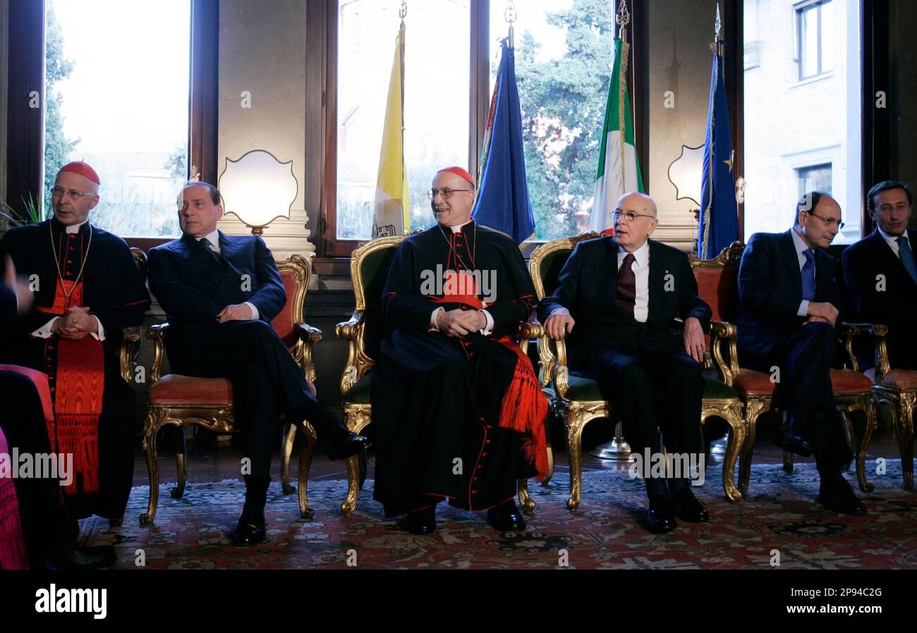 From left, Cardinal Angelo Bagnasco, Italian Premier Silvio Berlusconi ...