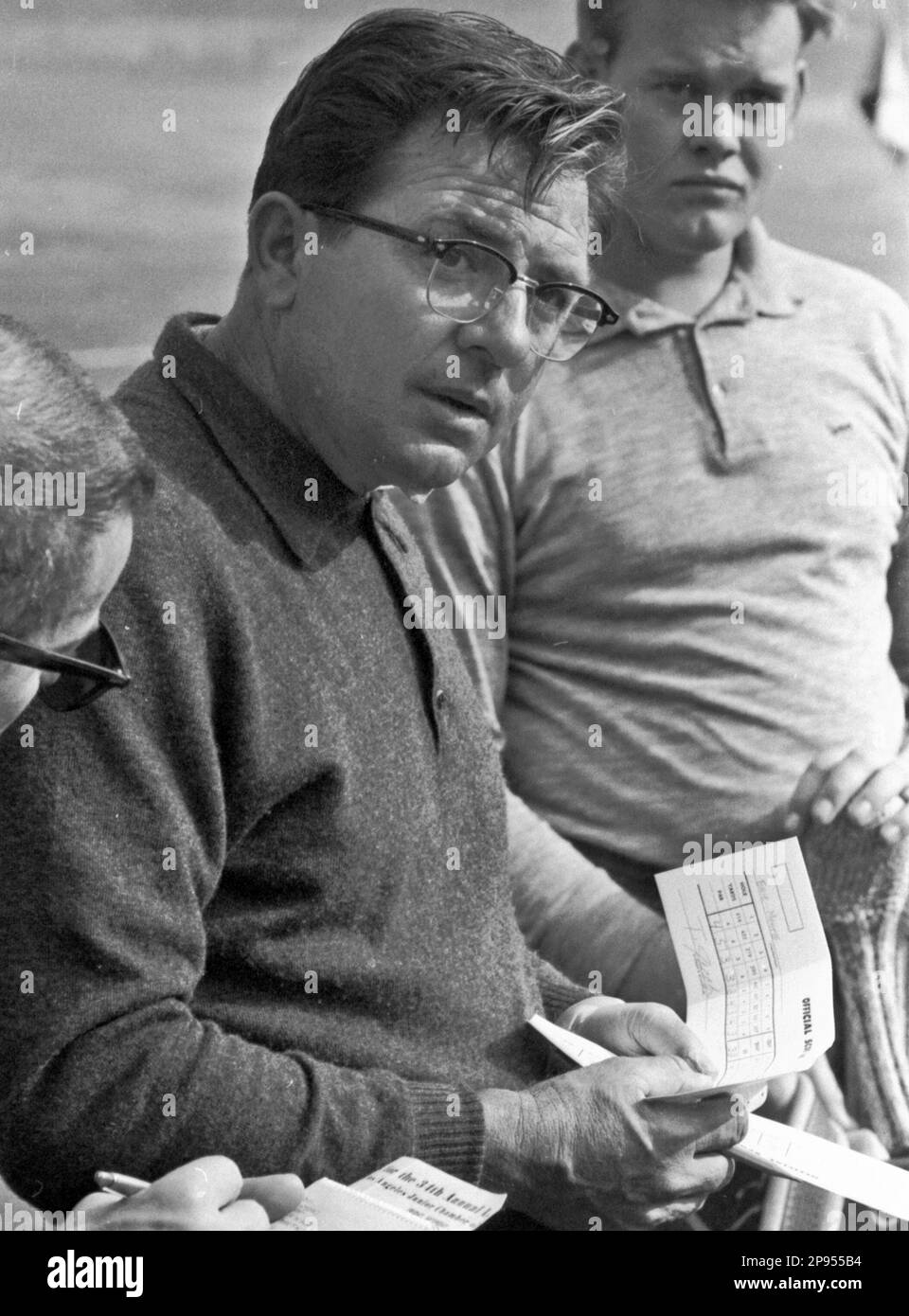 ** FILE ** In this Jan. 8, 1960, file photo, Eric Monti signs his card after scoring a 5-under ...