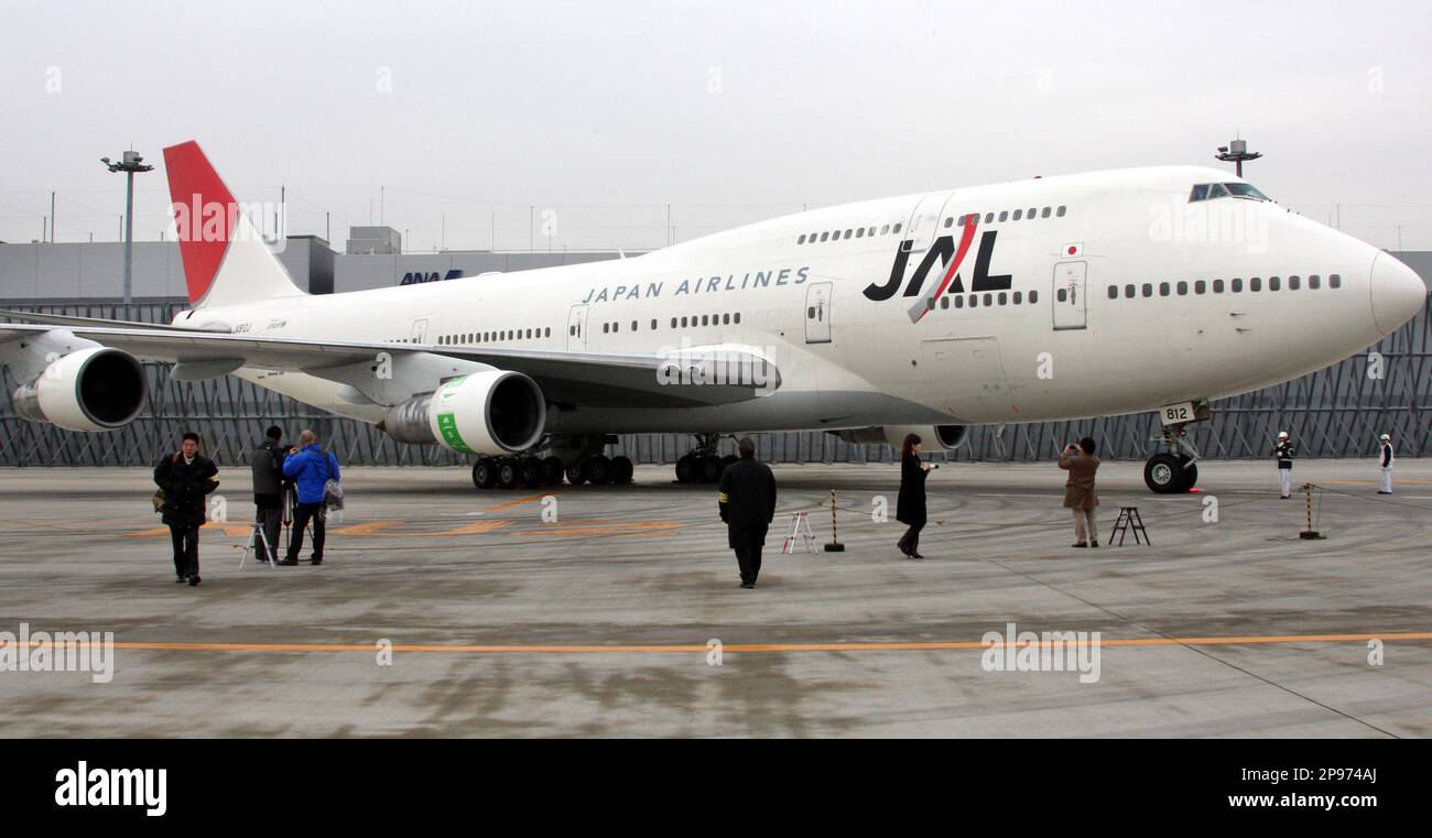 Biofuel-loaded Japan Airlines Boeing 747-300 sits on the ground during ...