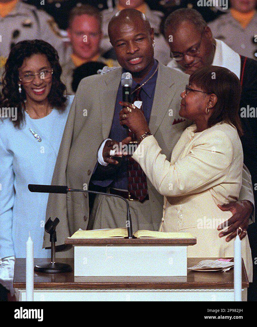 Vincent 'Tree' Williams (cq), standing center, gestures as he recalls a ...