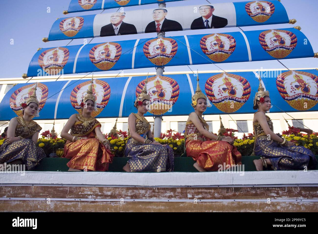 Young Cambodian women dressed as traditional dancers known as "Apsara's ...