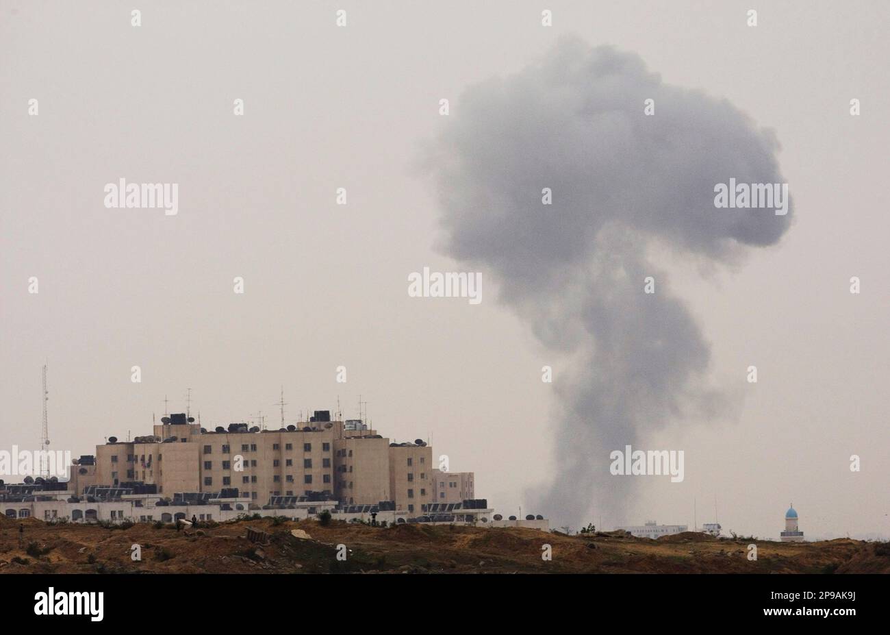 Smoke rises from Israeli missile strikes in the northern Gaza Strip is ...