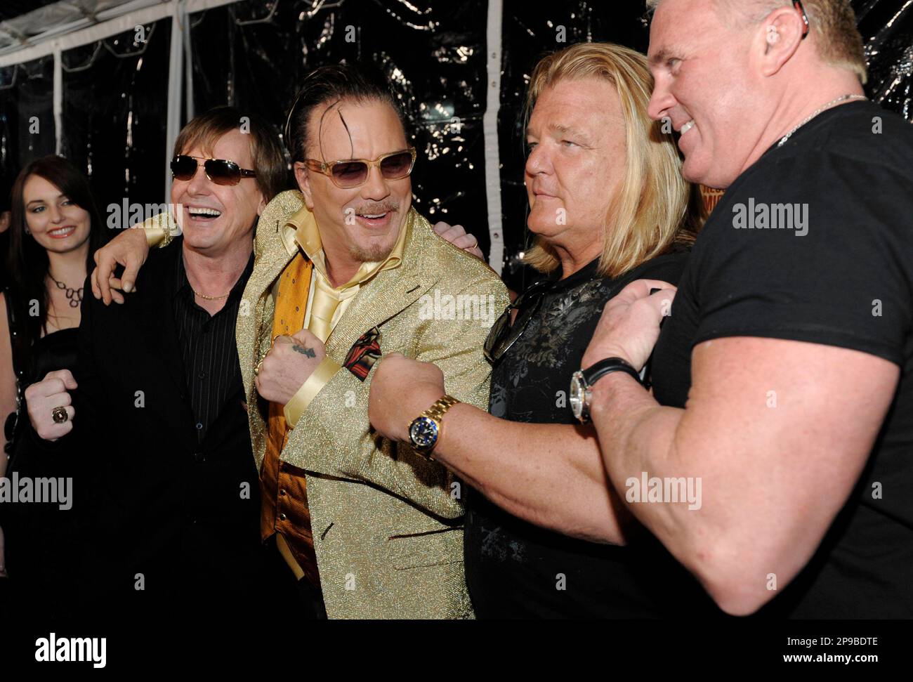 Mickey Rourke, second from left, star of "The Wrestler," poses with ...