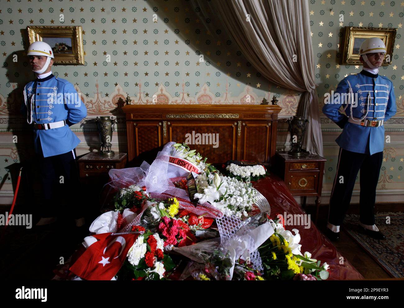 Turkish soldiers stand guard next to the death bed of Ataturk at the ...