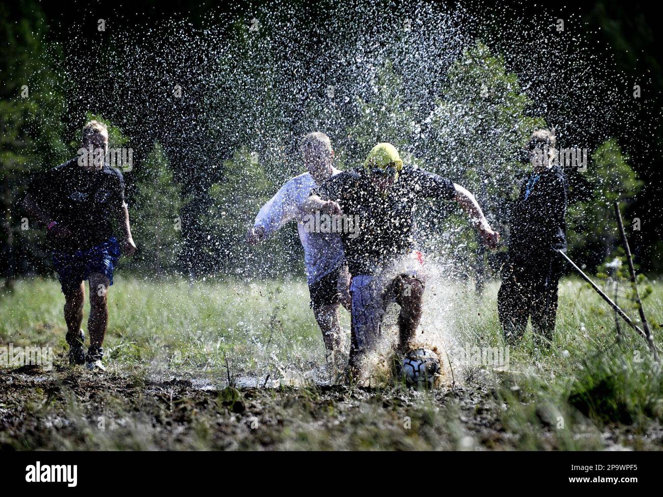Players in action at the Swamp Soccer World Championships in Hyrynsalmi ...