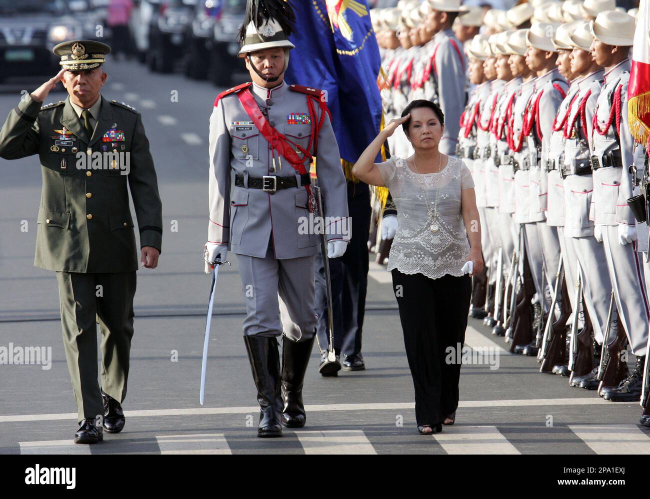 Philippine President Gloria Macapagal Arroyo, third from left, together ...